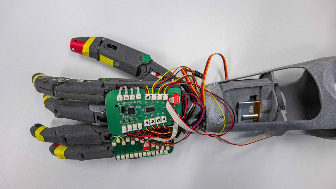 Researcher from WUT in a team developing a bionic hand prosthesis ...